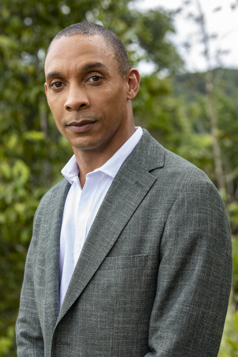 Micah Balfour guest stars in Death in Paradise, with Genesis Lynea