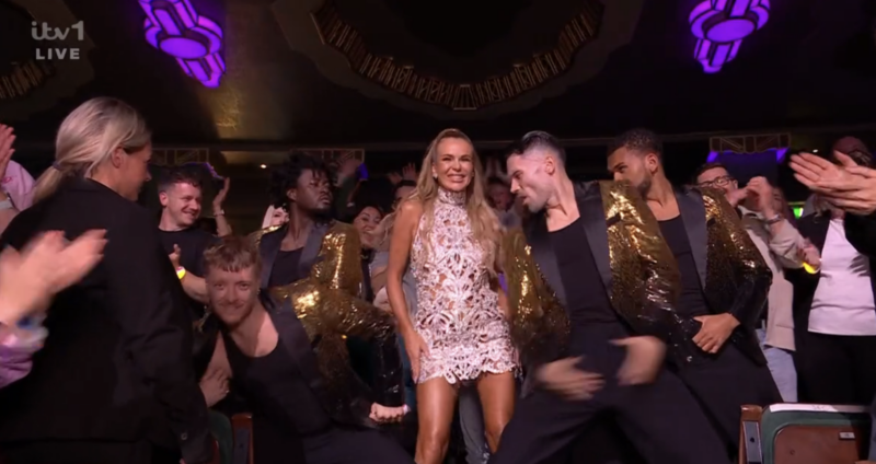 BGT judge Amanda Holden distracts viewers in daring cutout dress